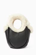 Buy Coperni Black Mini Swipe Bucket Bag in Shearling and Leather Online ...