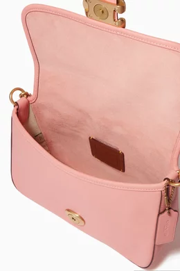 pink coach purse tabby